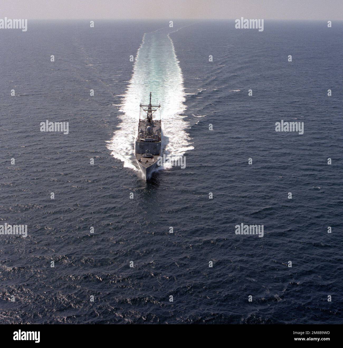 A bow beam view of the guided missile frigate USS MAHLON S. TISDALE ...