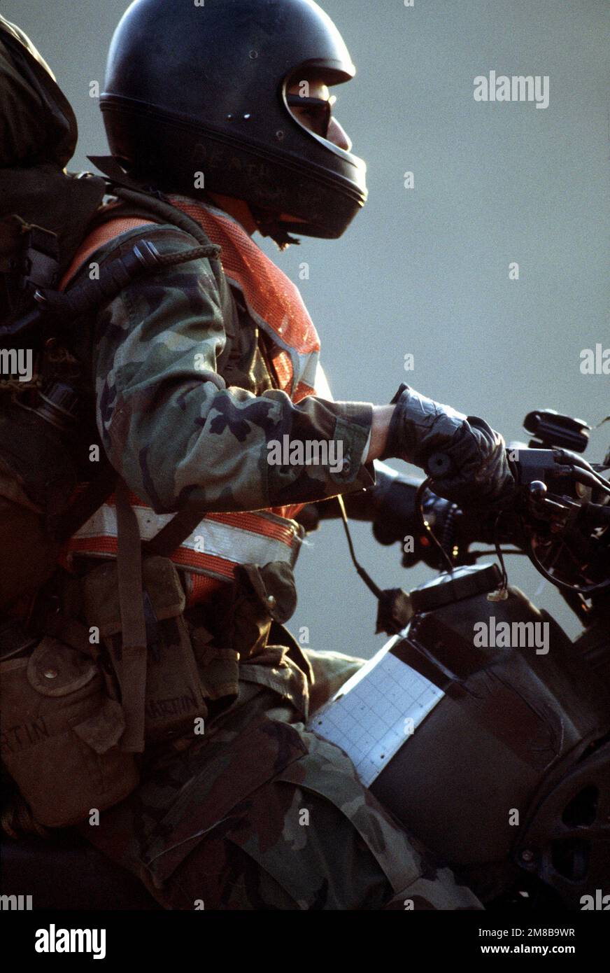 A Marine scout sits on his motorcycle during Team Spirit '89. Country ...