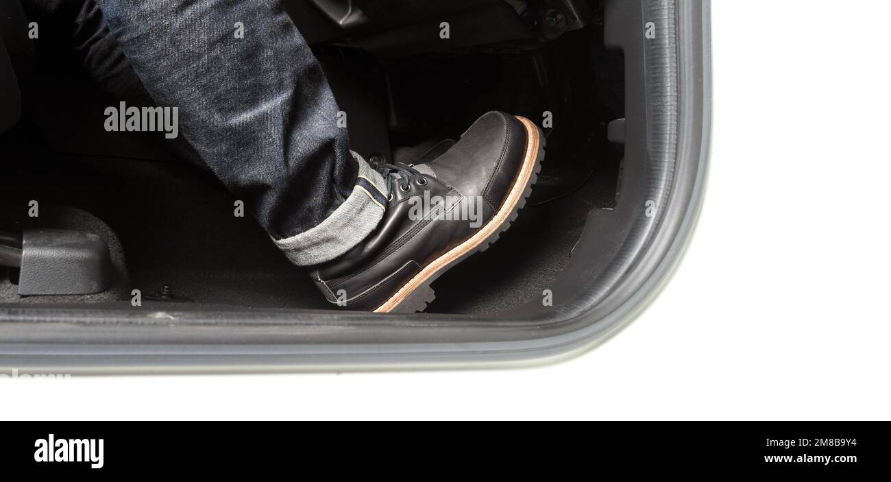 Car accelerate and brake foot pedal. Close up foot press or push foot ...