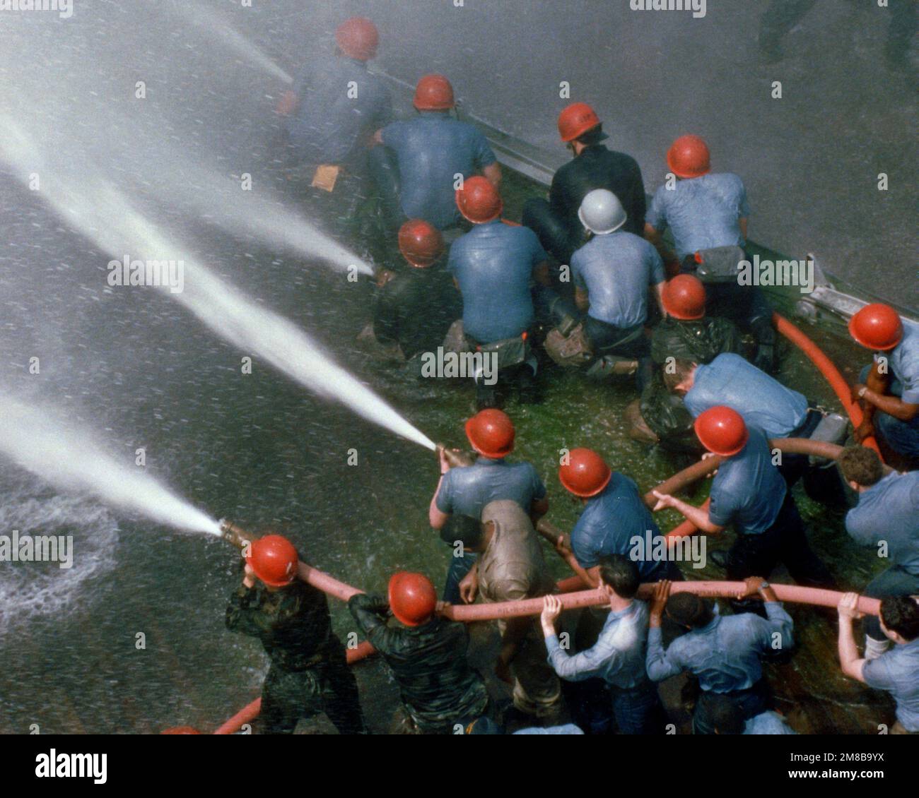 A photo taken from the bridge captures the efforts taken to combat fire ...