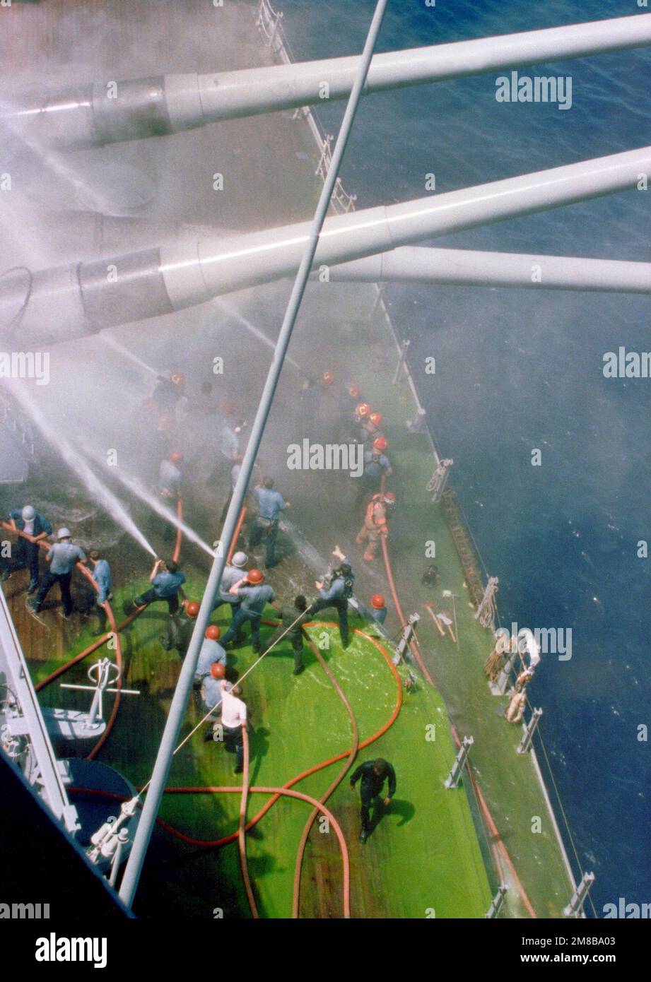 A photo taken from the bridge captures the efforts taken to combat fire ...