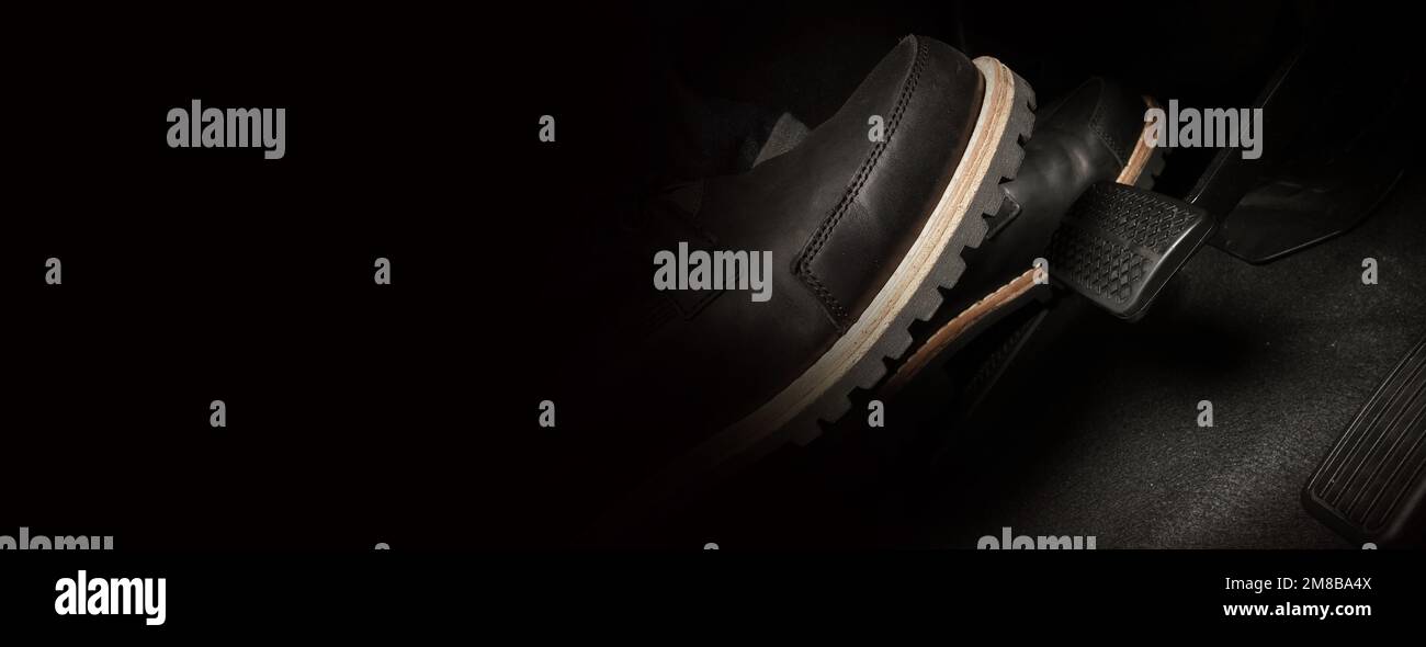 Car accelerate and brake foot pedal. Close up foot press or push foot ...