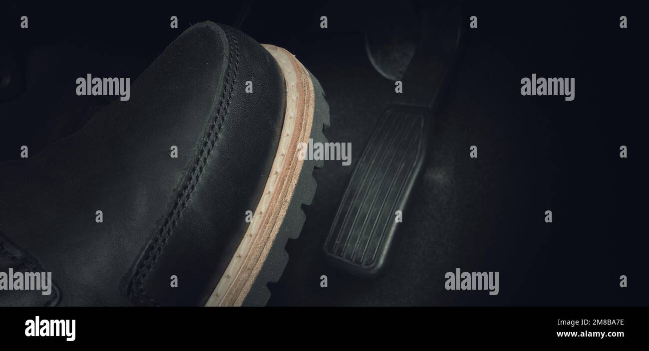 Car accelerate and brake foot pedal. Close up foot press or push foot ...