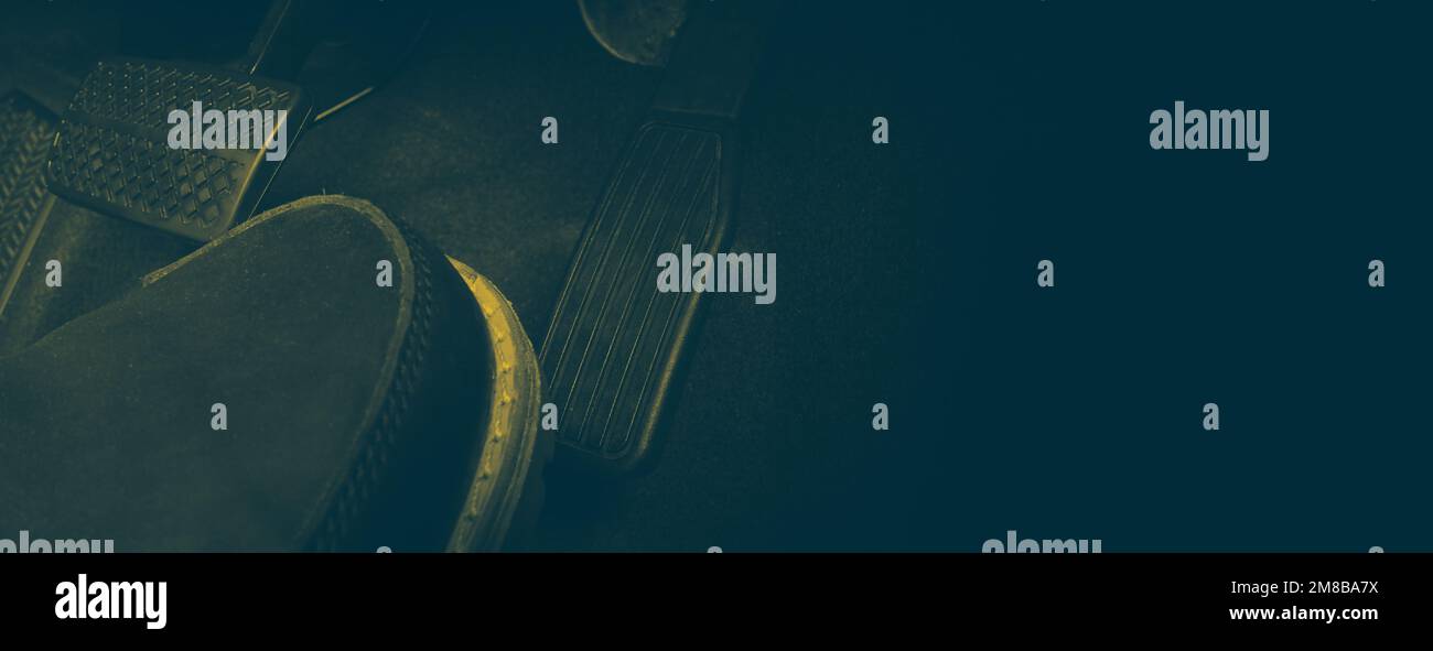 Car accelerate and brake foot pedal. Close up foot press or push foot ...