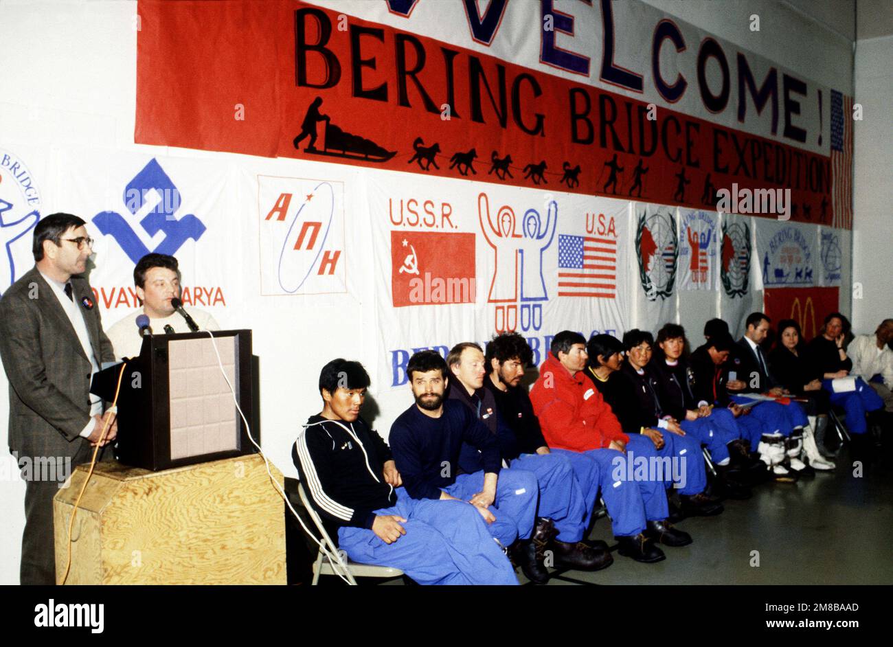 Members of the joint Soviet-American Bering Bridge Expedition listen to ...