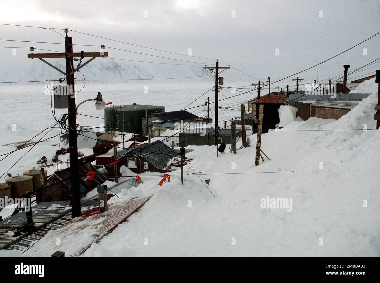 Snow covers the village of Little Diomede on the arrival date of the ...