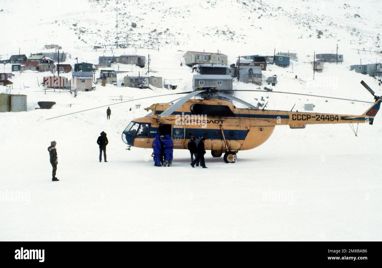 Soviet dignitaries and members of the Soviet press prepare to depart ...