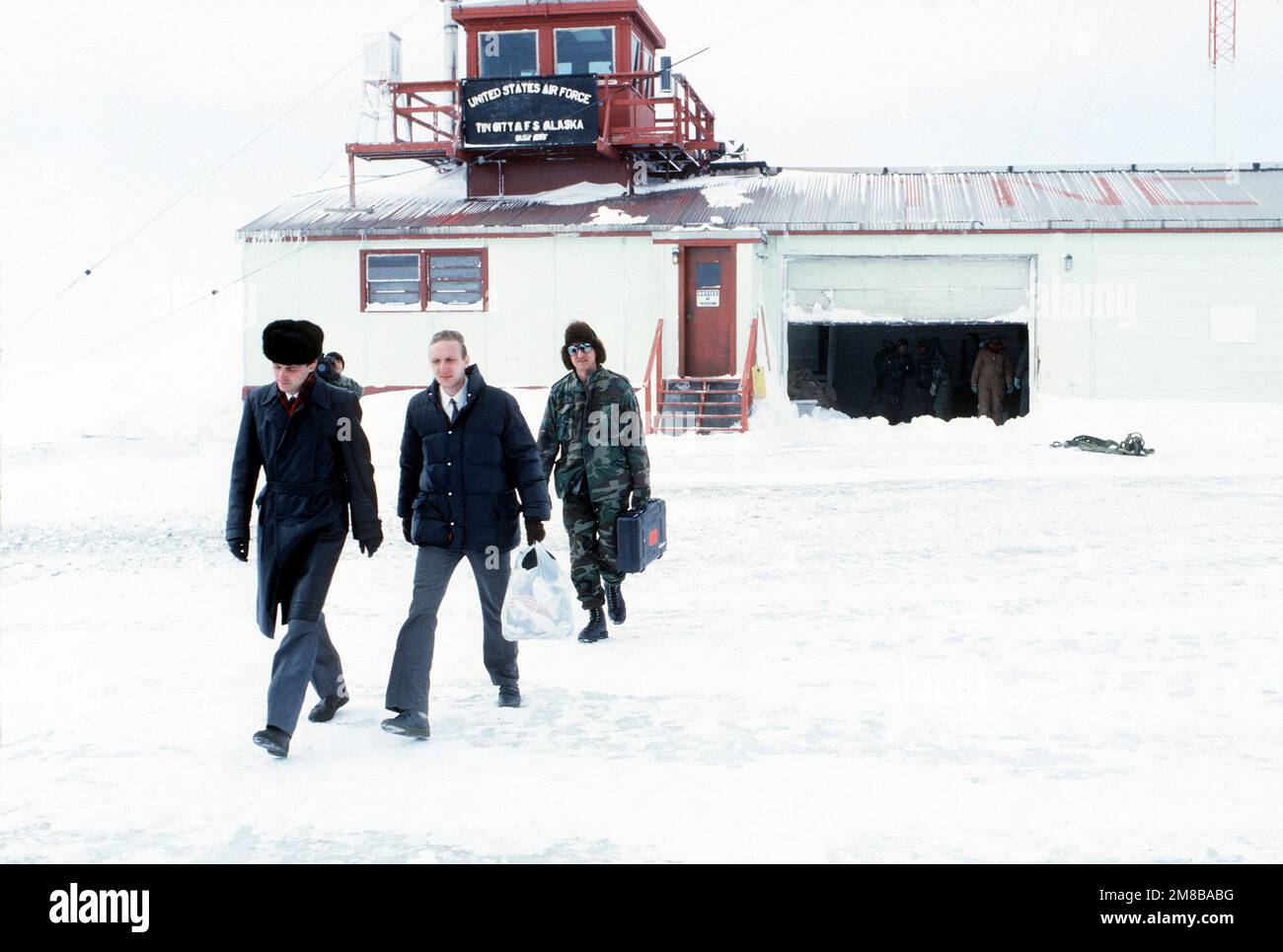 Accompanied by an Alaska Air National Guardsman, Soviet defectors ...