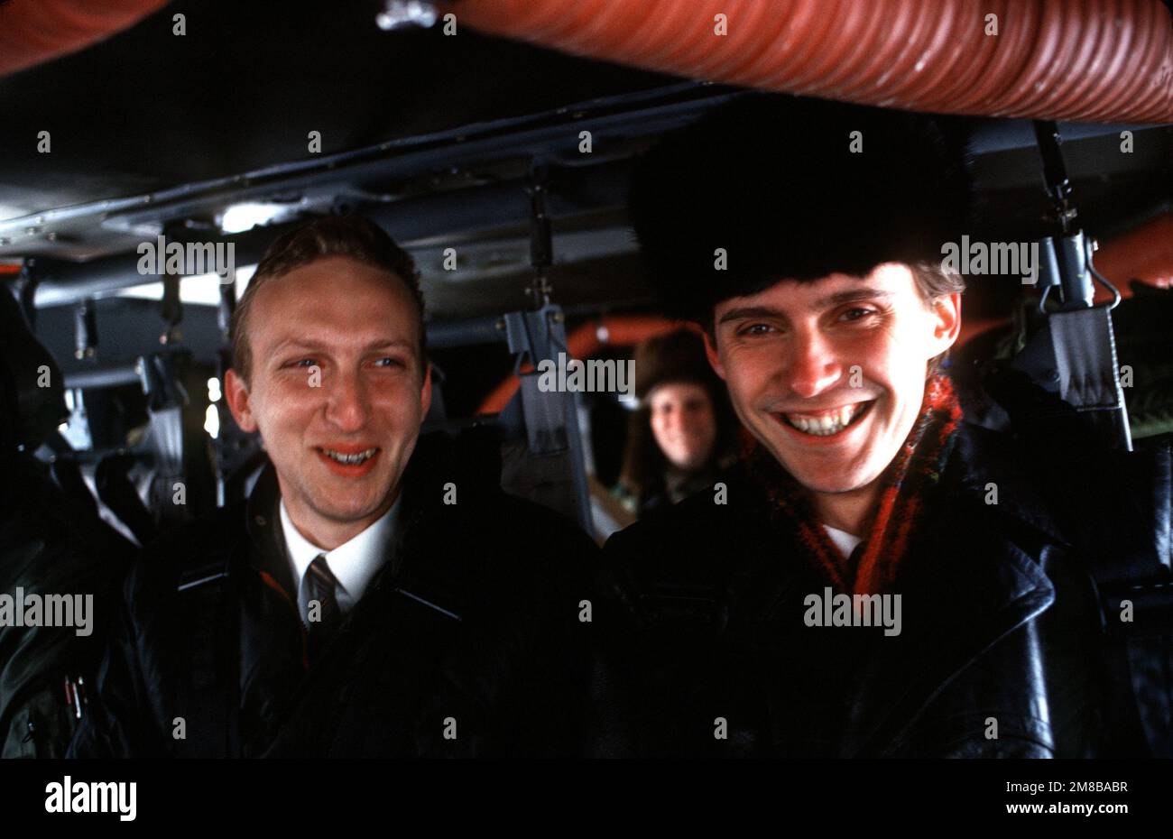 Soviet defectors Alexander Kendr, right, smile for the camera as they ...