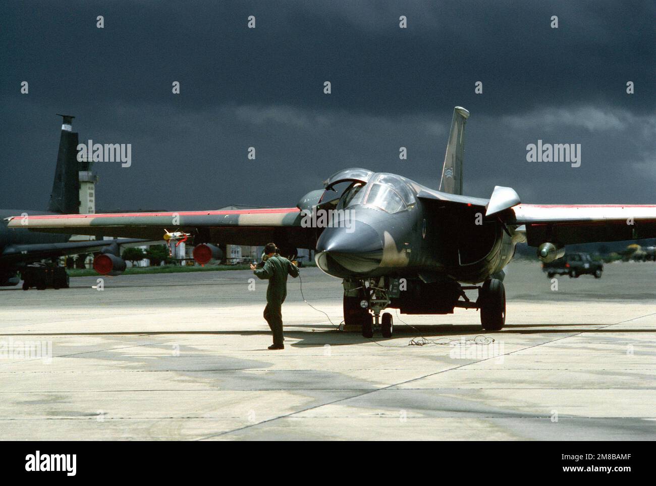 A ground crewman checks a 495th Tactical Fighter Wing F-111F aircraft ...