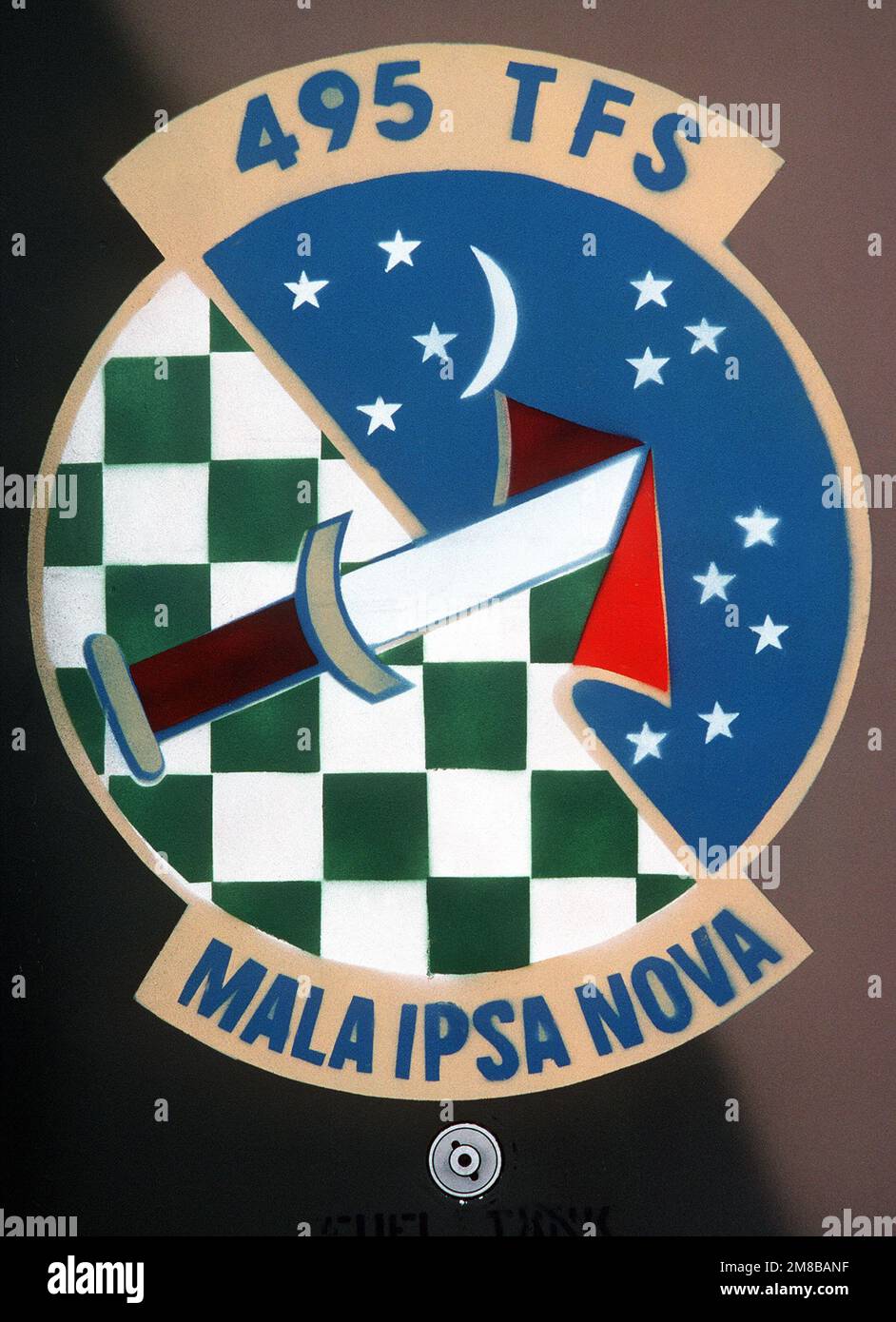 A close-up of a squadron emblem on the side of an F-111F aircraft of ...