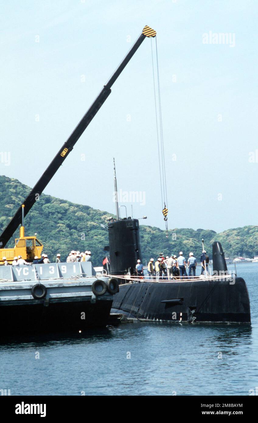 The attack submarine USS DARTER (SS 576) is docked at the pier in ...
