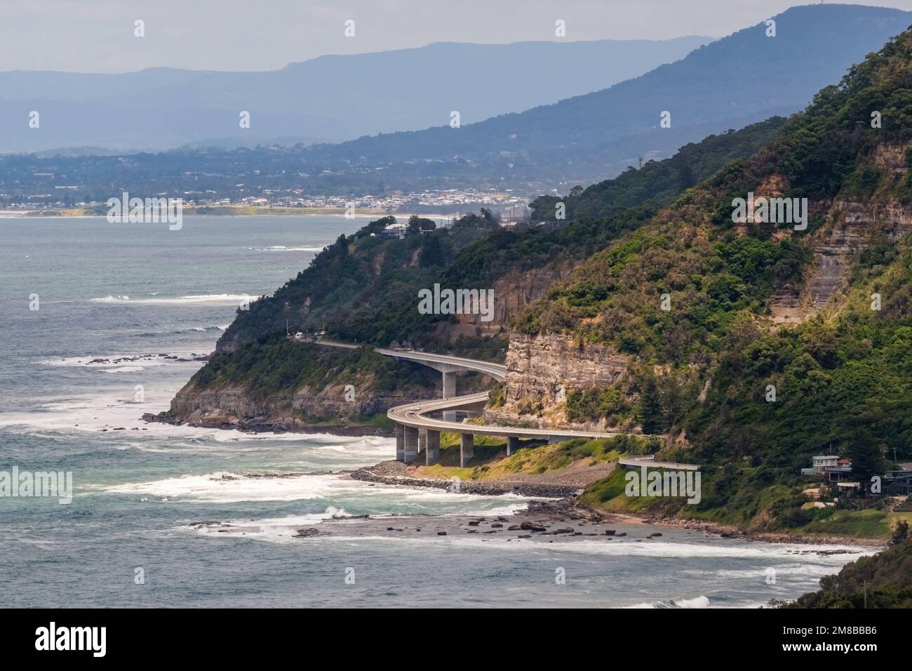 Sea Cliff Bridge, a balanced cantilever bridge built in 2005, curves ...