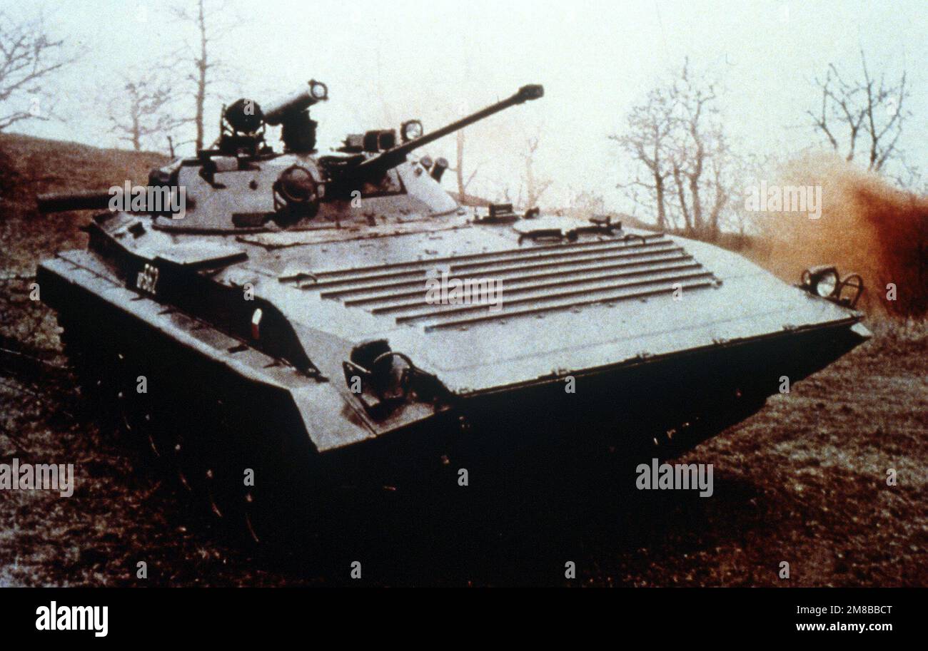 A right front view of a Soviet BMP-2 armored personnel carrier armed ...