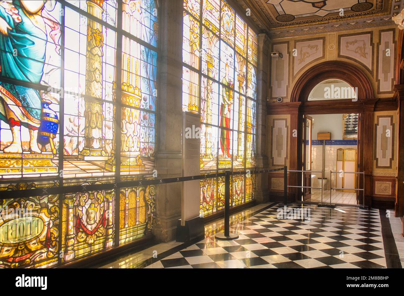 A beautiful view of stained glass windows inside the castle of ...