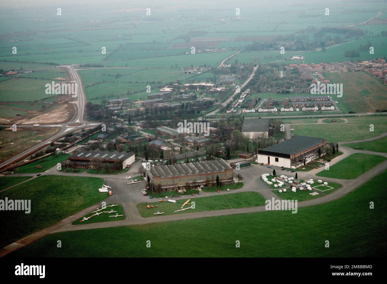 An aerial view of a portion of the base and surrounding area. The 317th ...