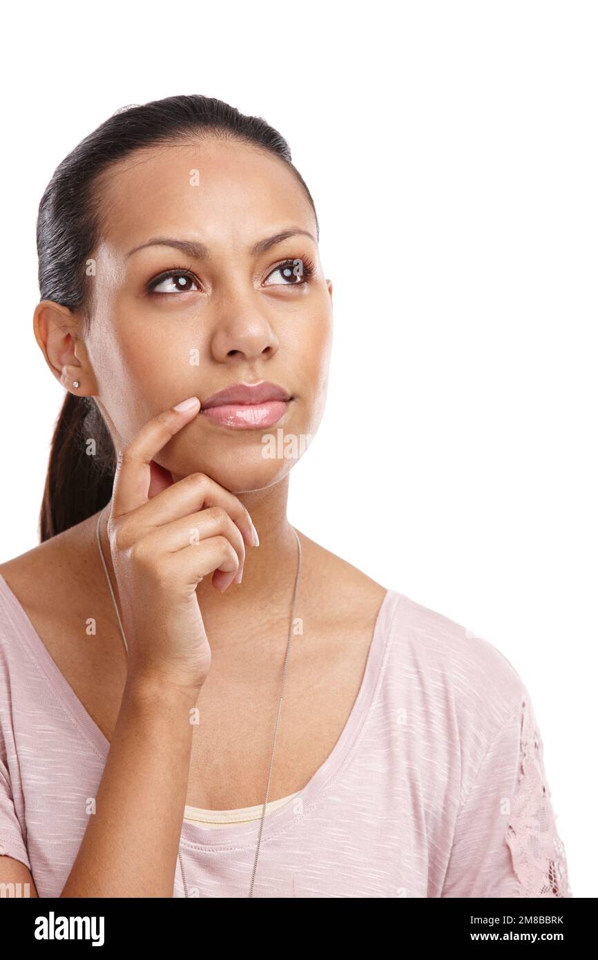 Woman, face and thinking with inspiration and focus in studio, mindset ...