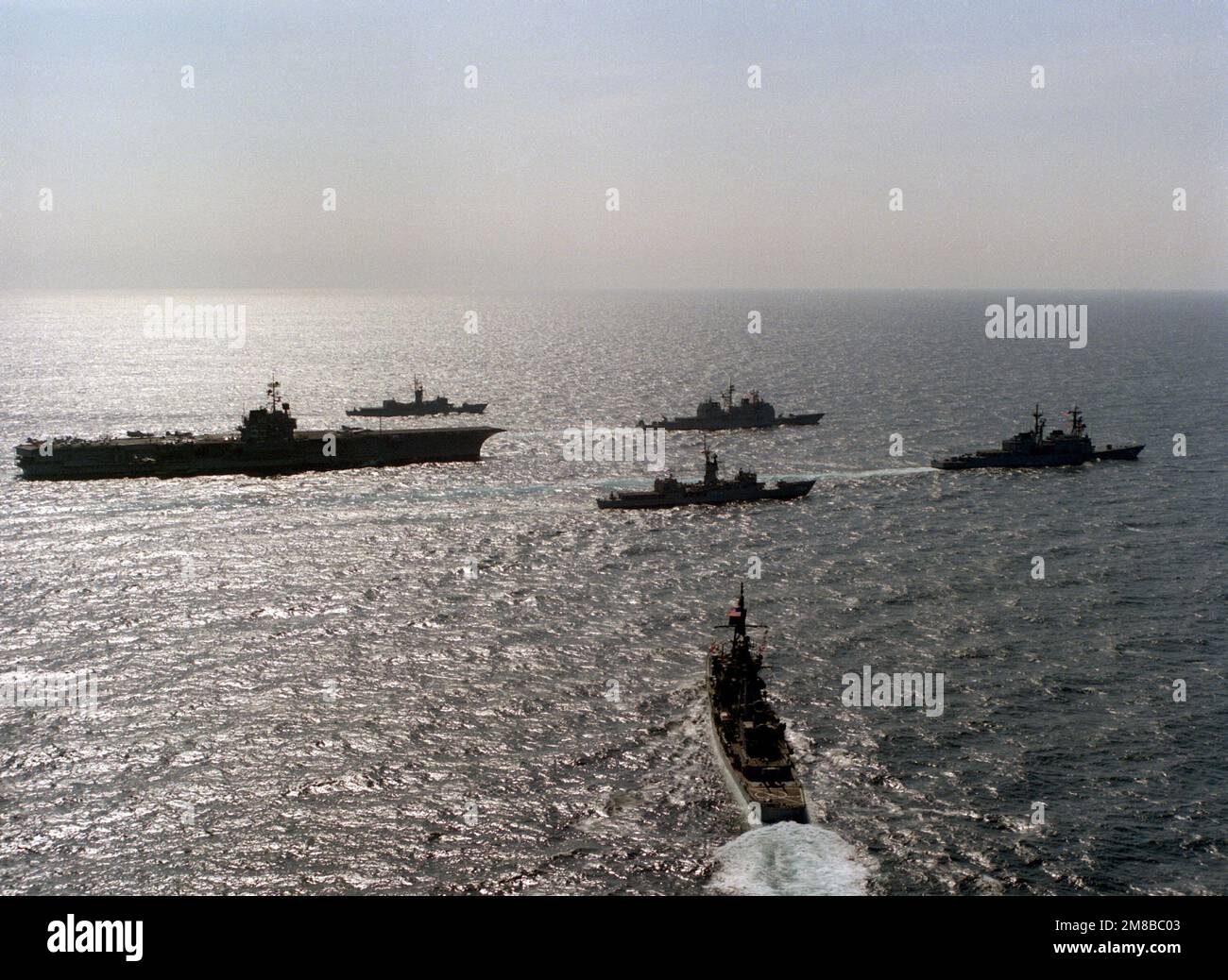 The aircraft carrier USS FORRESTAL (CV-59), left, and its accompanying ...