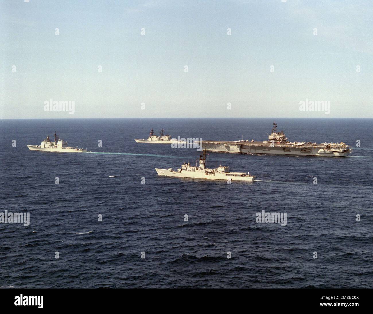 Four ships of the aircraft carrier USS FORRESTAL (CV-59) battle group ...