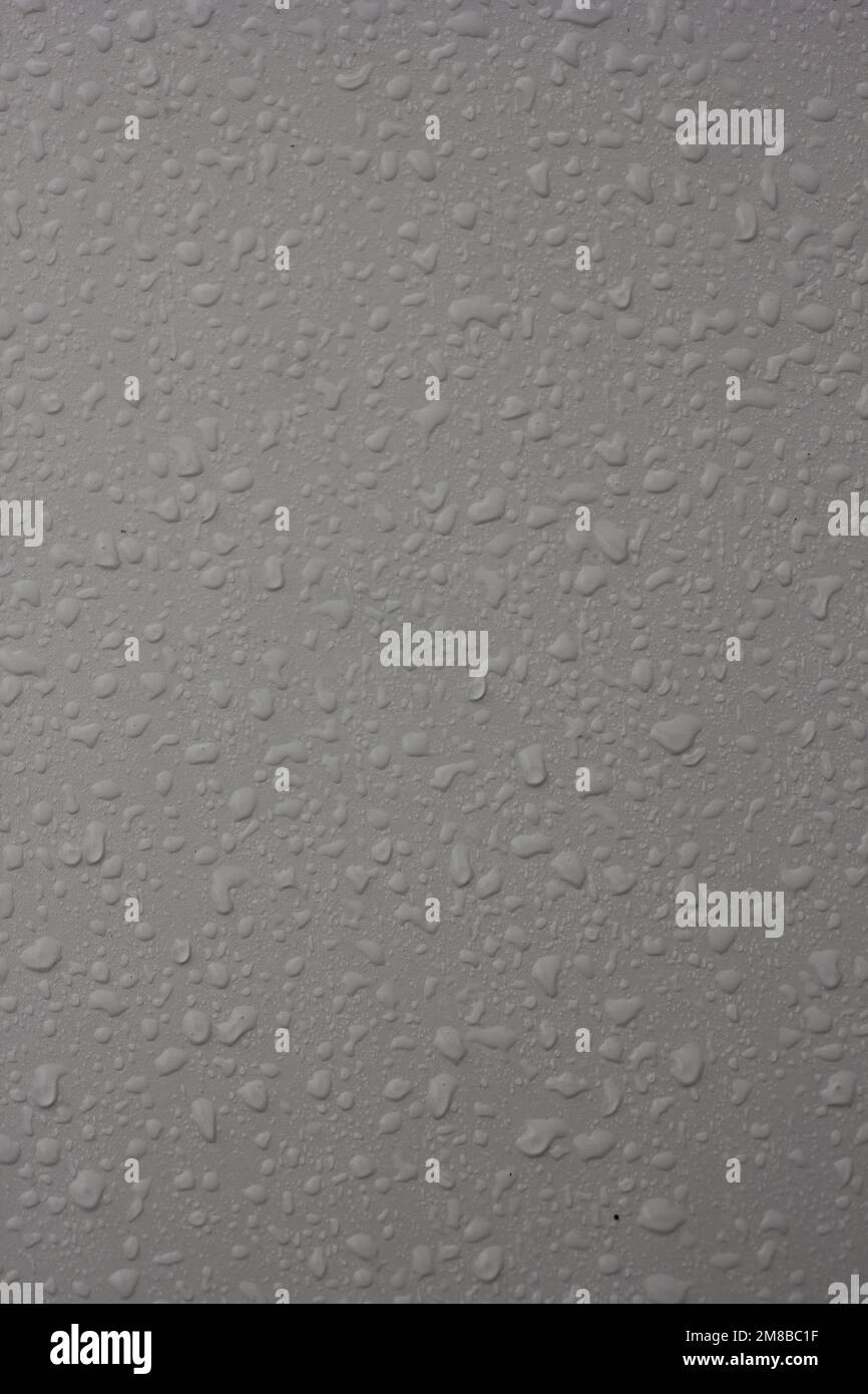 Wet wall with lots of fresh raindrops Stock Photo - Alamy