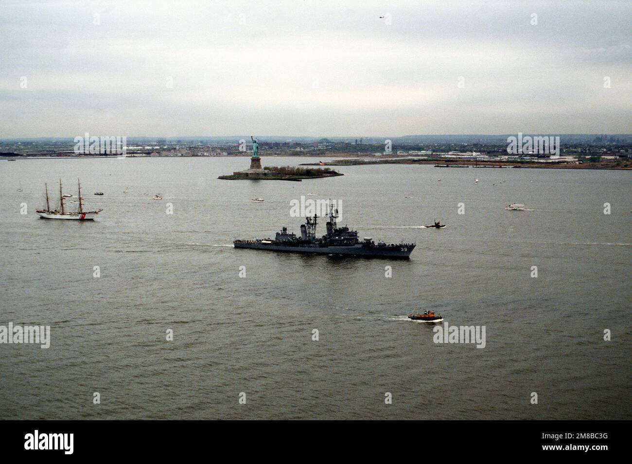 The guided missile destroyer USS MACDONOUGH (DDG 39) steams past the ...