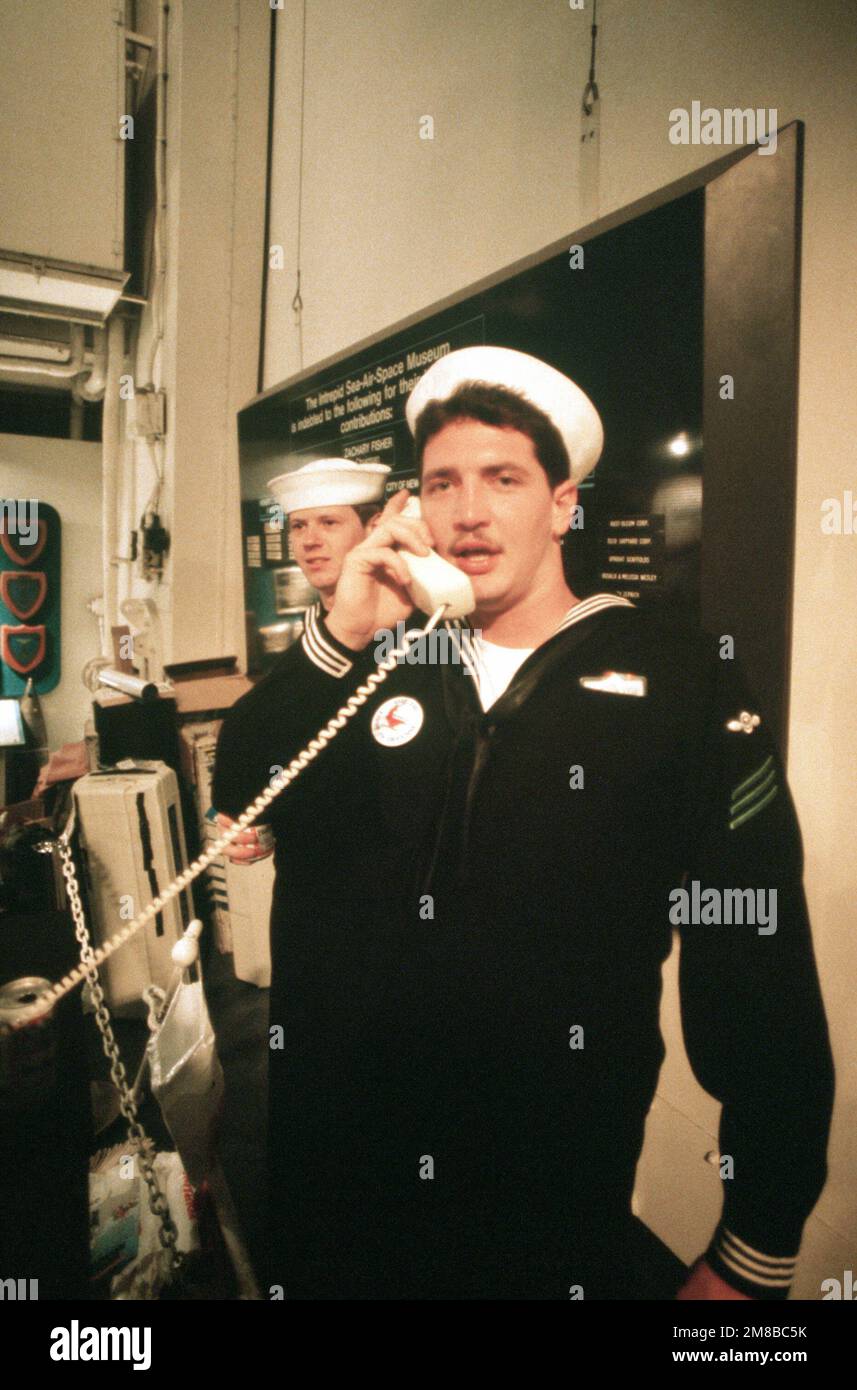 A sailor takes advantage of the opportunity to make a free, long ...