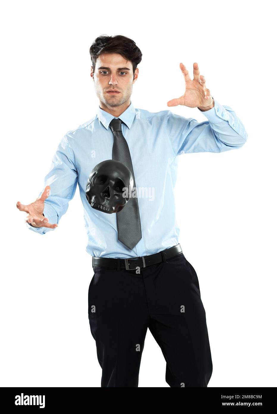 Business man, black skull and levitation in studio isolated on a white ...