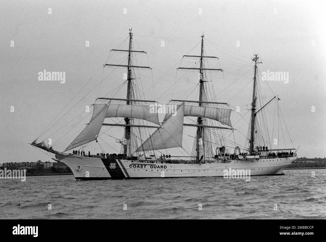 The Coast Guard training bark USCGC EAGLE (WIX 327) moves slowly ...