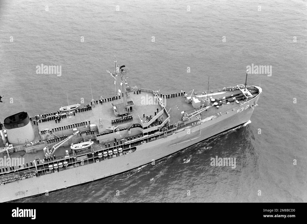 A partial view of the submarine tender USS HOLLAND (AS 32) with its ...