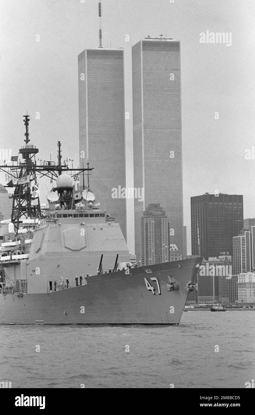 The guided missile cruiser USS TICONDEROGA (CG 47) sits off of ...