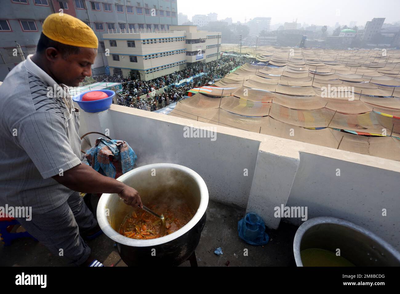 Dhaka, 13/01/2023, Muslim devotees cook food during noon prayers at the ...