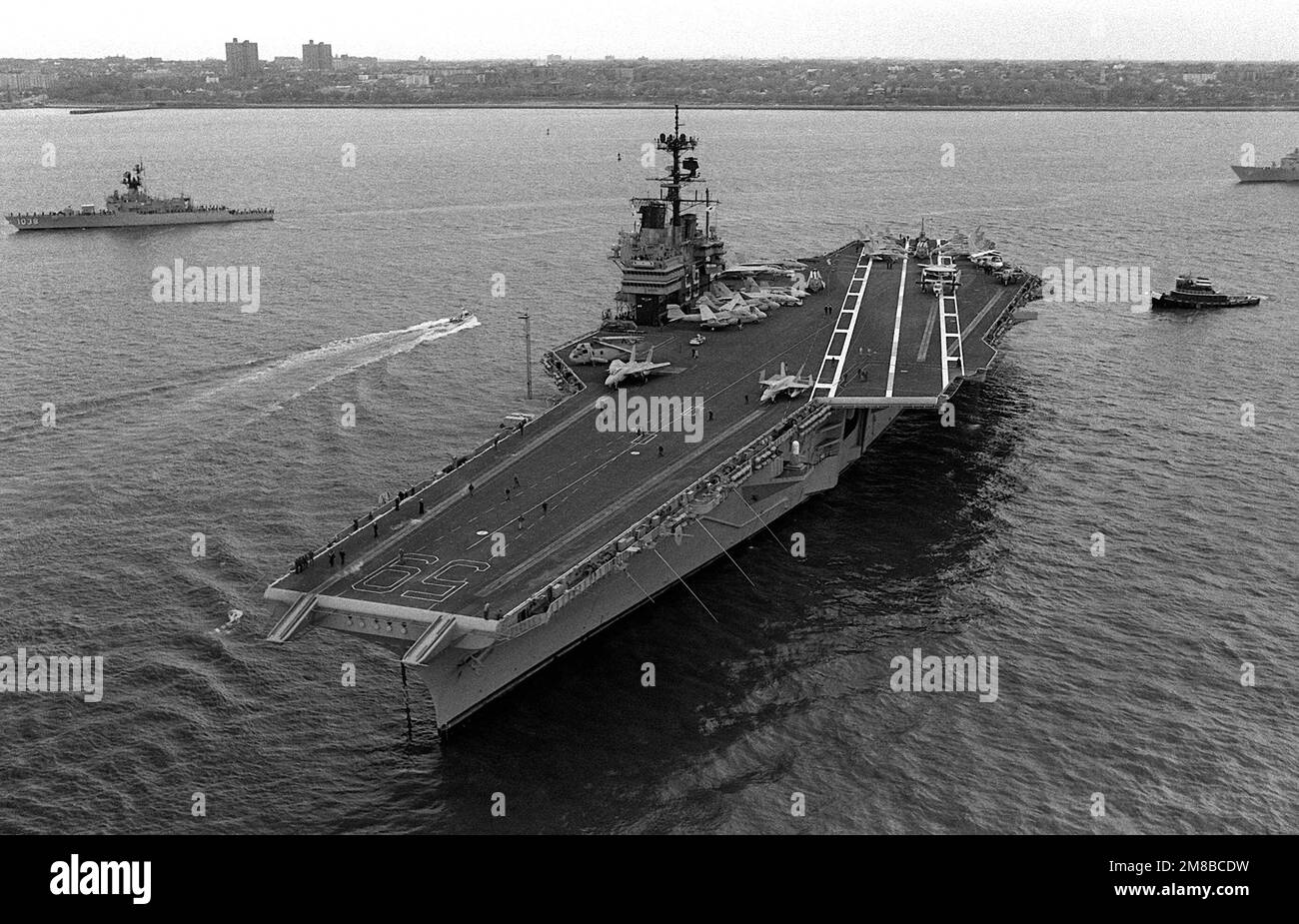 The aircraft carrier USS FORRESTAL (CV-59) lies at anchor during the ...
