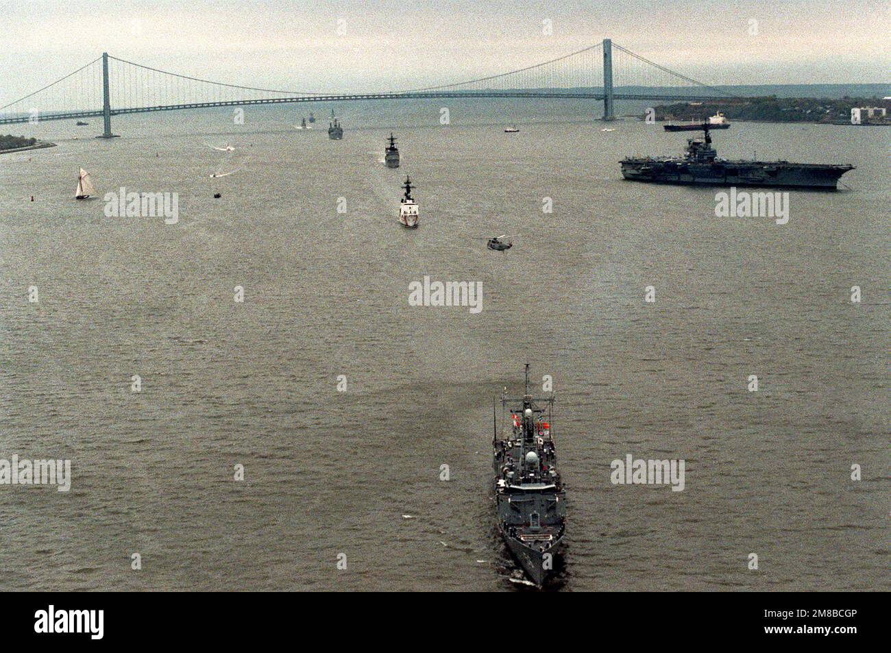 The guided missile frigate USS SIMPSON (FFG 56) and a parade of other ...