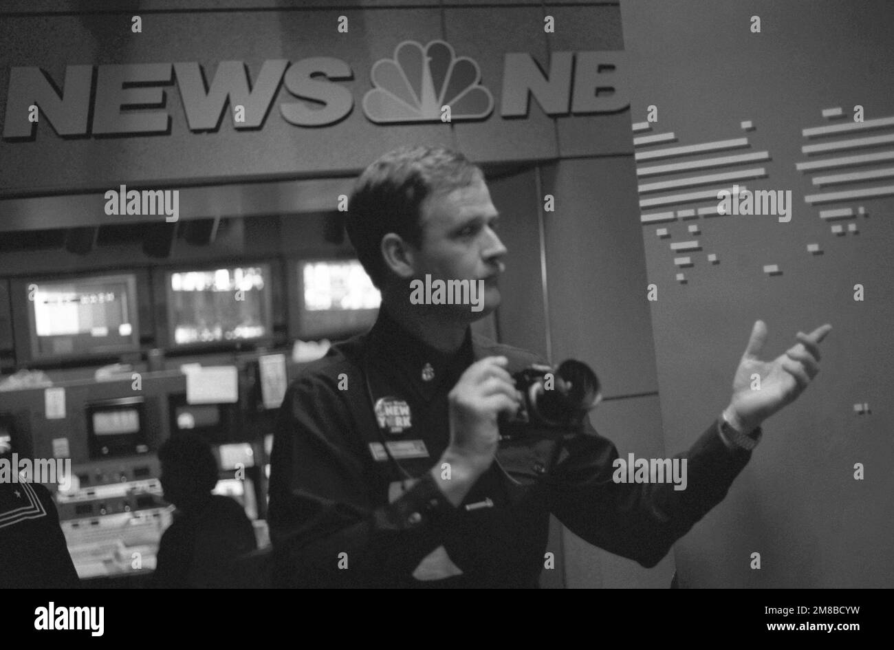 CHIEF Photographer's Mate John Fleming waits to take a photograph on ...