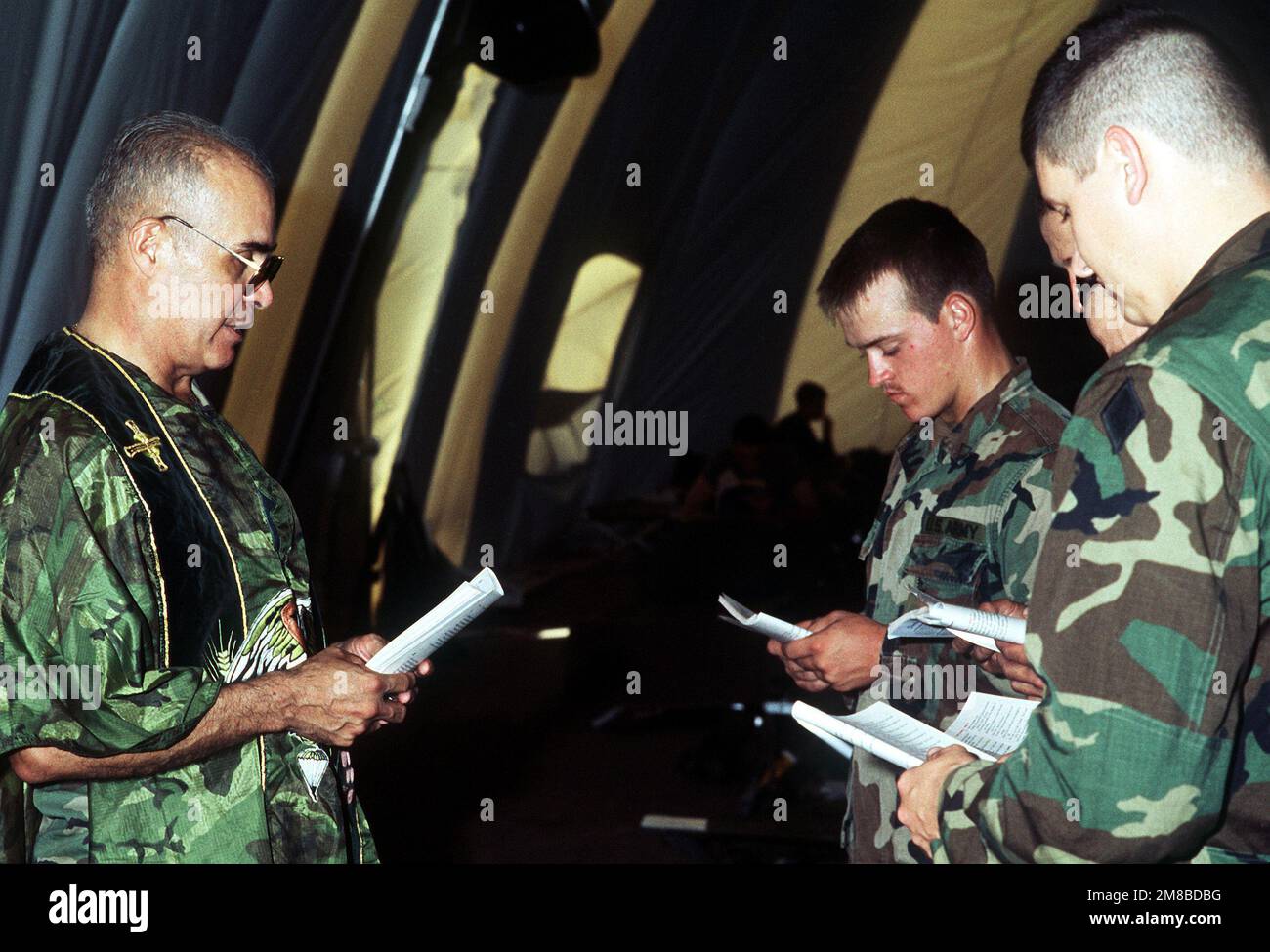 COL. Mike Ties, Southern Command chaplain, prays with soldiers during ...