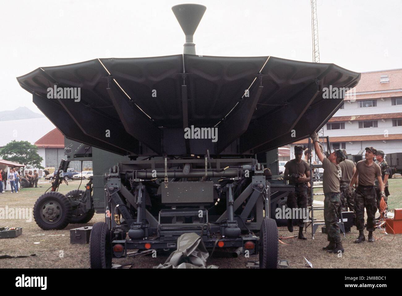 Members of the 31st Communications Squadron make a final adjustments ...