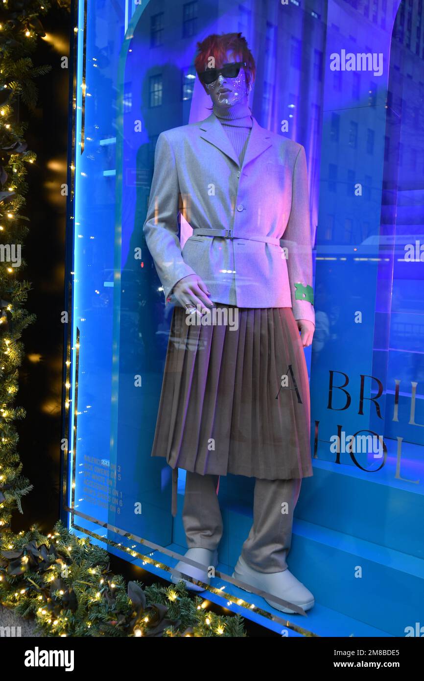 Spectators view holiday window display at Saks Fifth Avenue in NYC ...