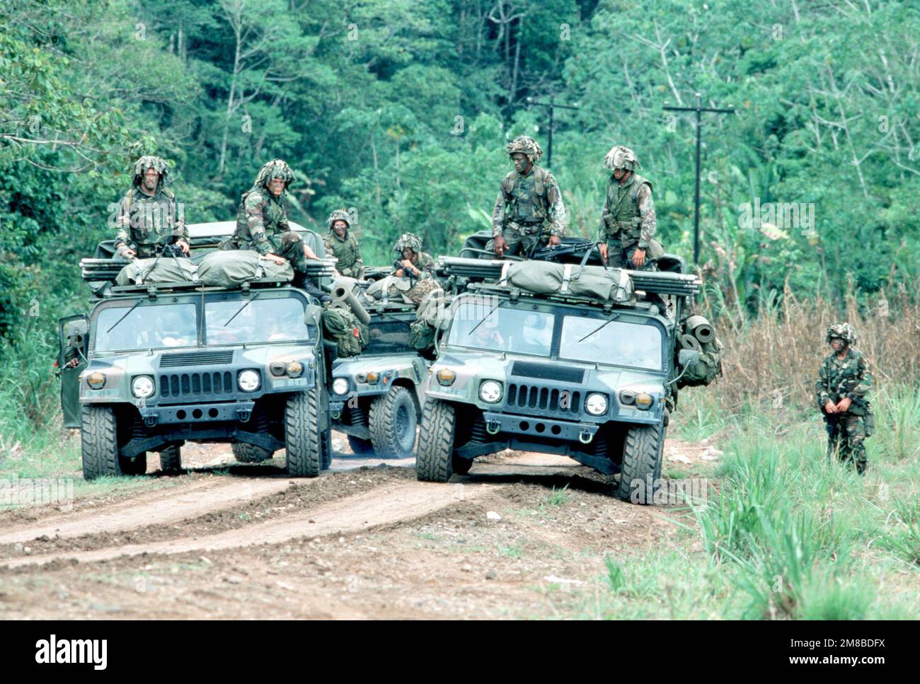 Members of the 2nd Battalion, 8th Field Artillery, inspect a weapons ...