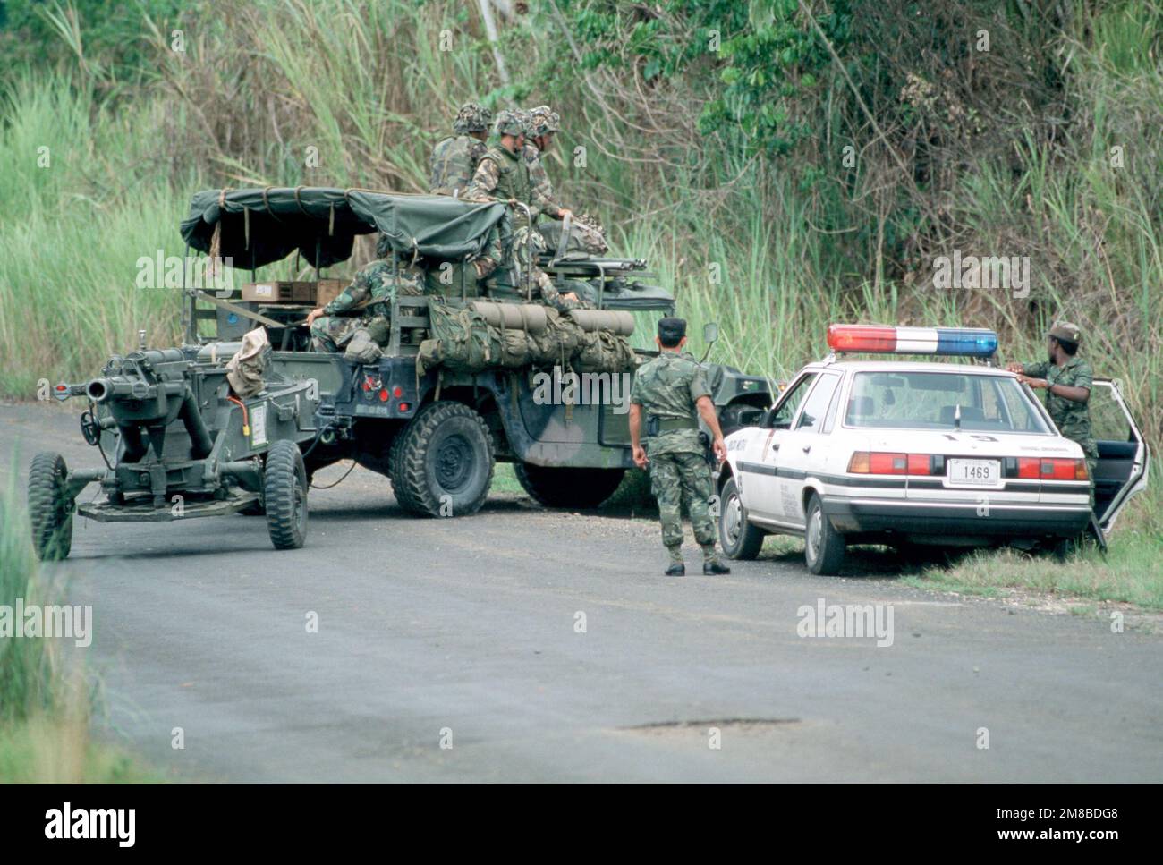 A member of the Panamian Defense Force (PDF) give directions to 2nd ...