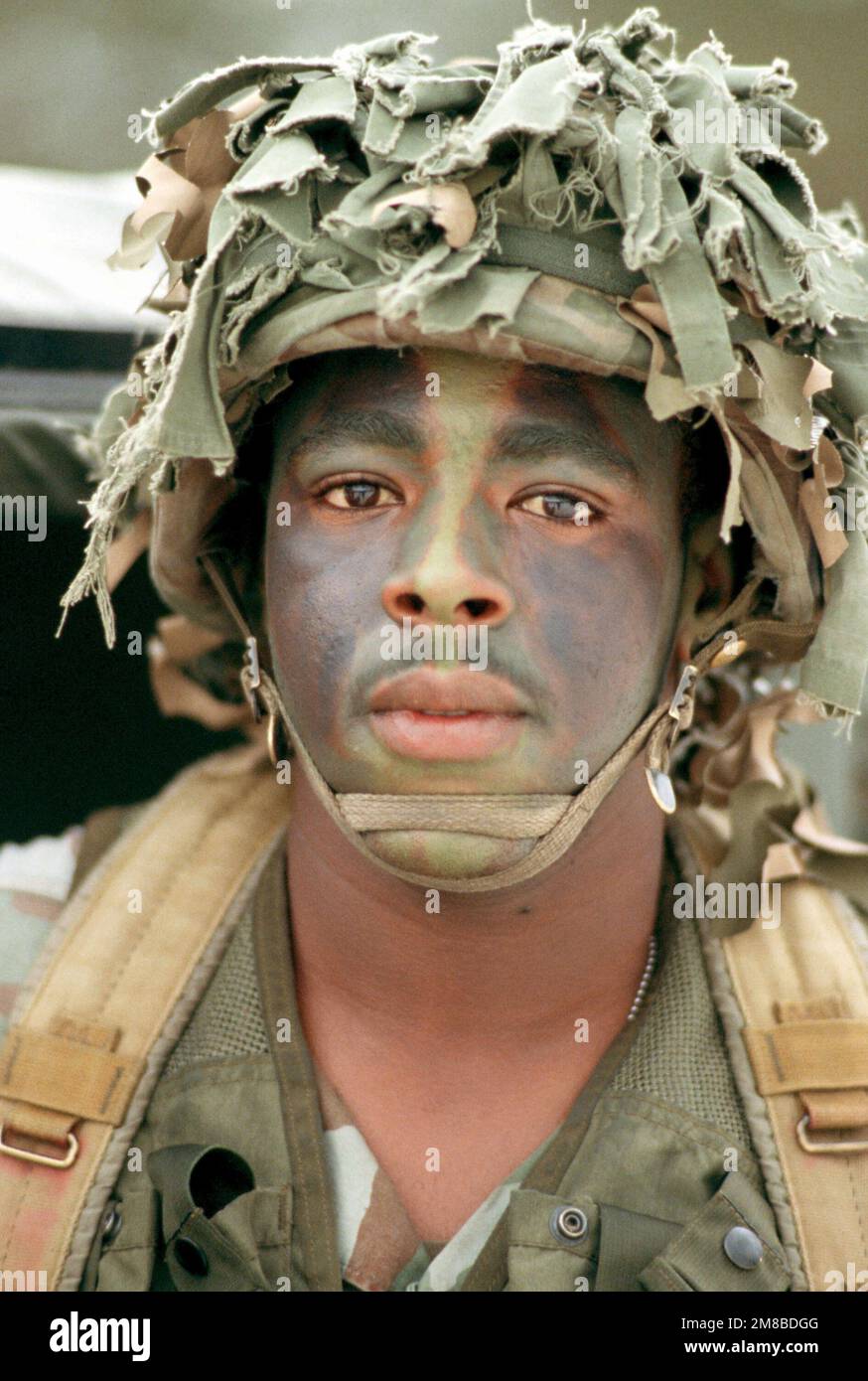 An informal portrait of Private First Class Edward J. Carrara at a ...