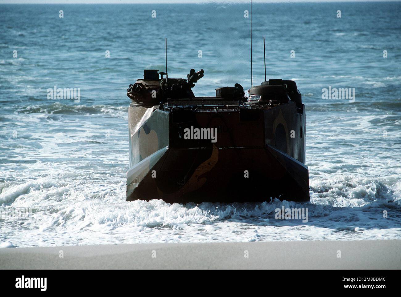 An AAVP-7 amphibious assault vehicle (AAV) carrying Marines of the 2nd ...