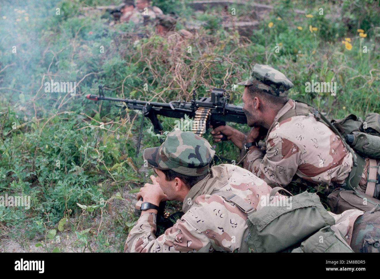 Occupying a defensive position at Atlantic Airfield, a Marine machine ...