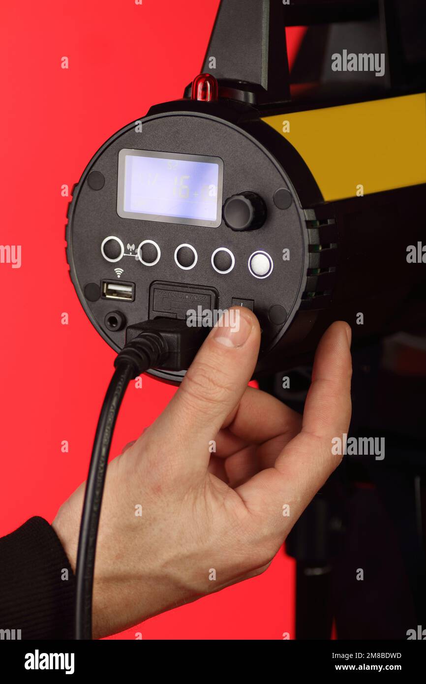 studio flash rear control panel on tripod and pink background Stock ...