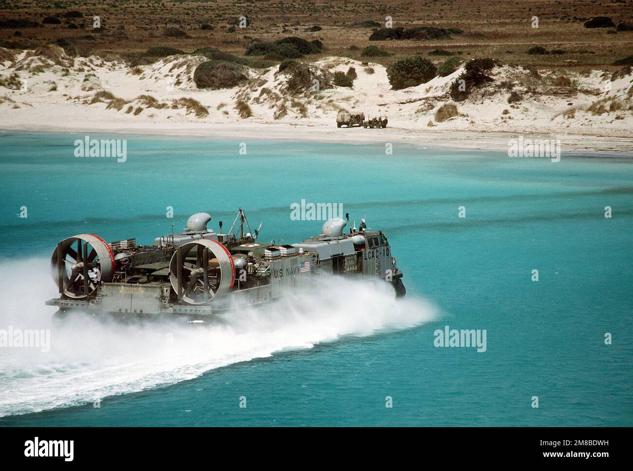 The air cushion landing craft LCAC-10, carrying a load of Marine Corps ...