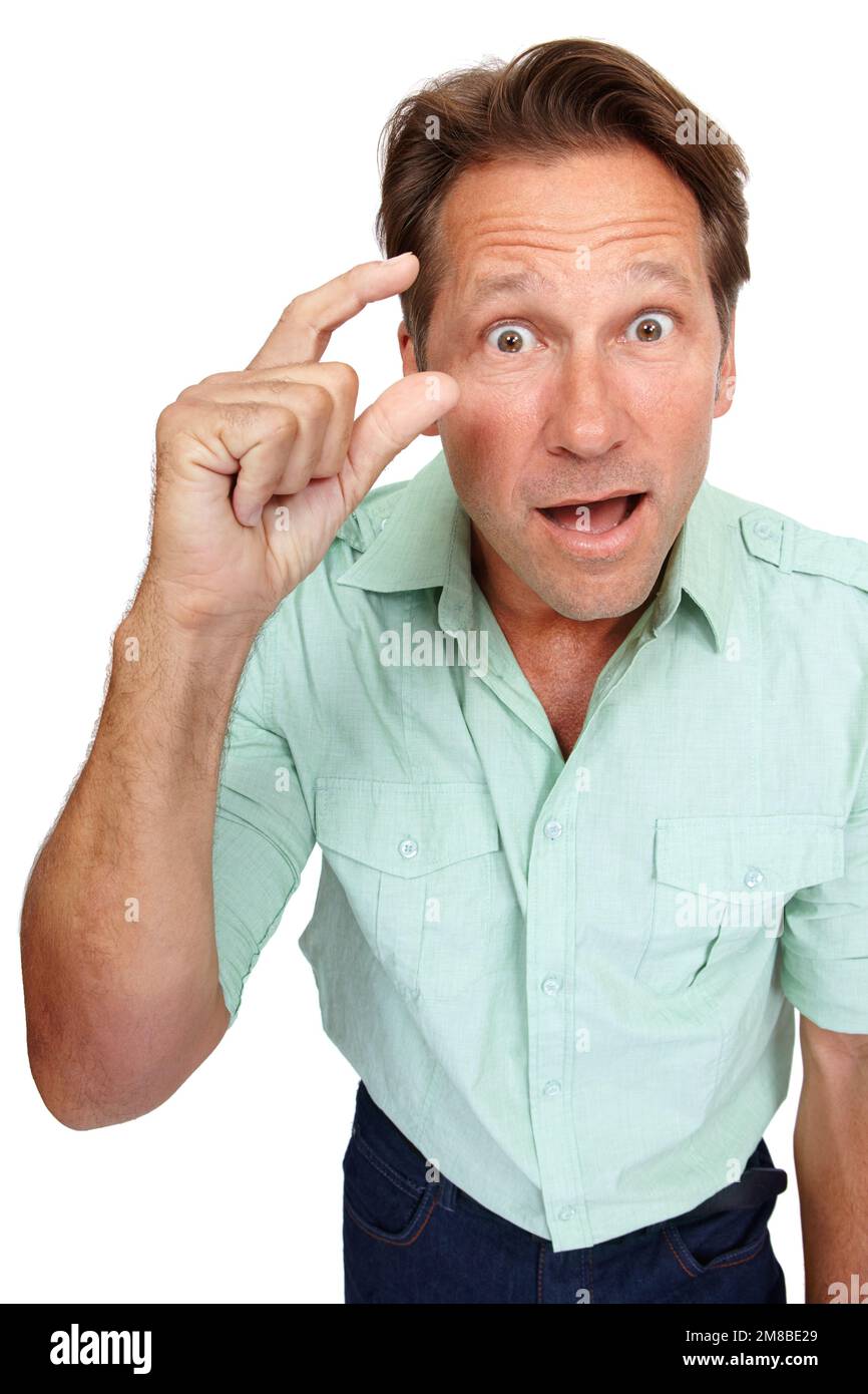 Portrait, man and hand sign for small size or length while surprised ...