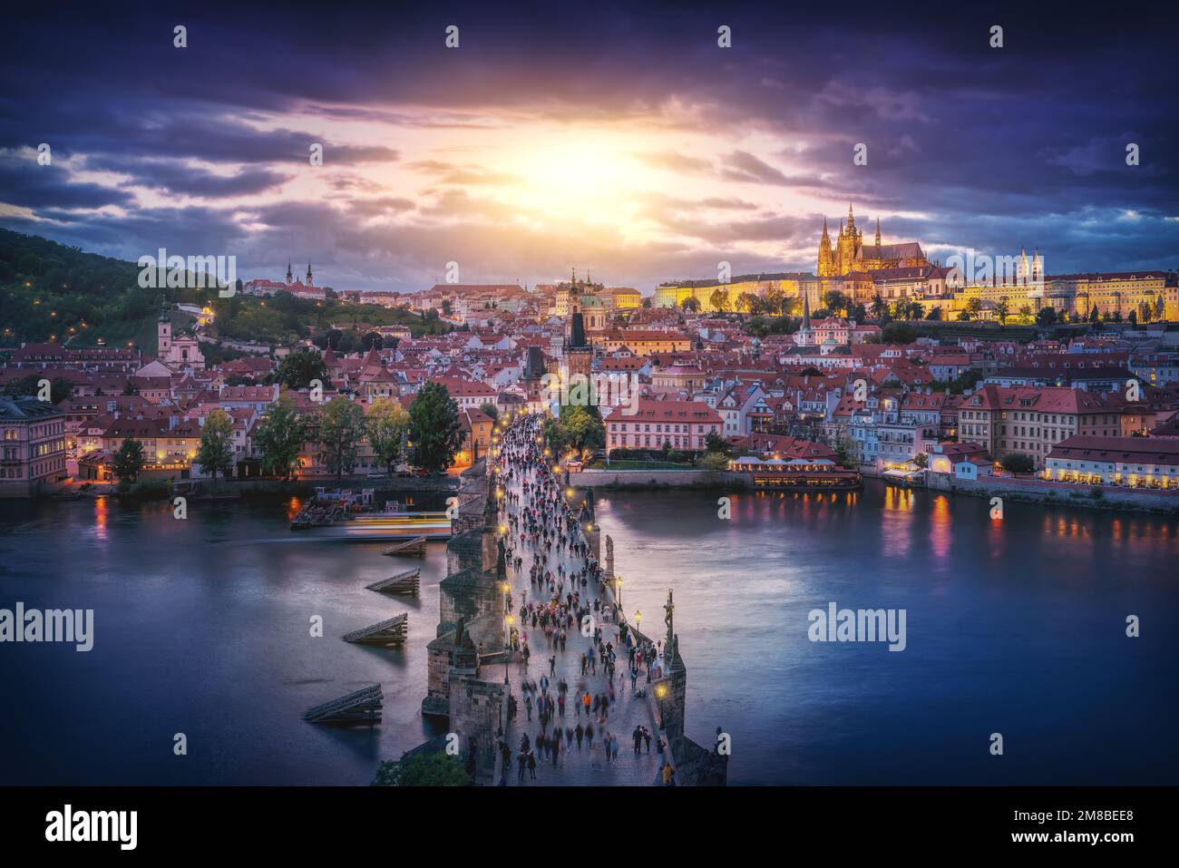 Aerial view of Charles Bridge at sunset with Prague Castle Skyline ...
