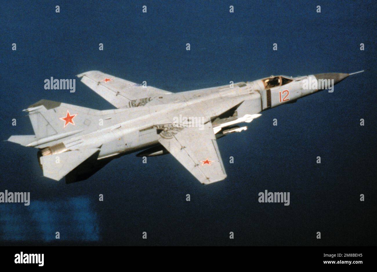 An air-to-air right side view of a Soviet MiG-23 Flogger aircraft ...