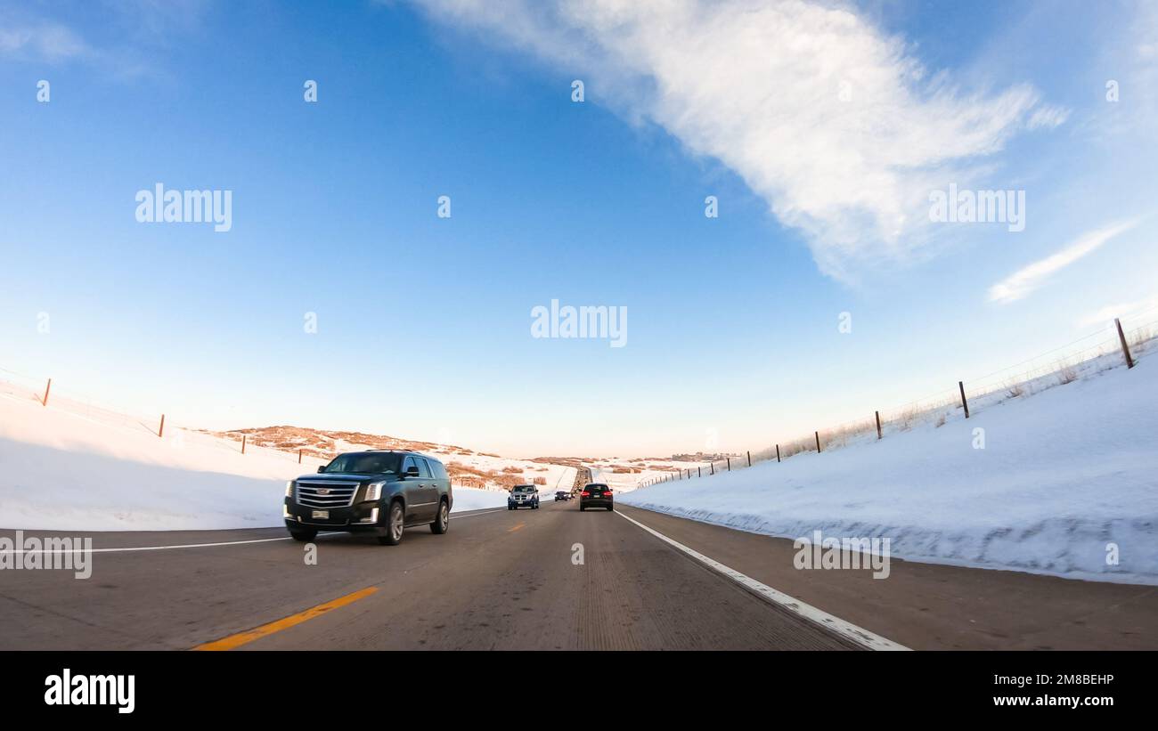 Driving in suburban area Stock Photo - Alamy