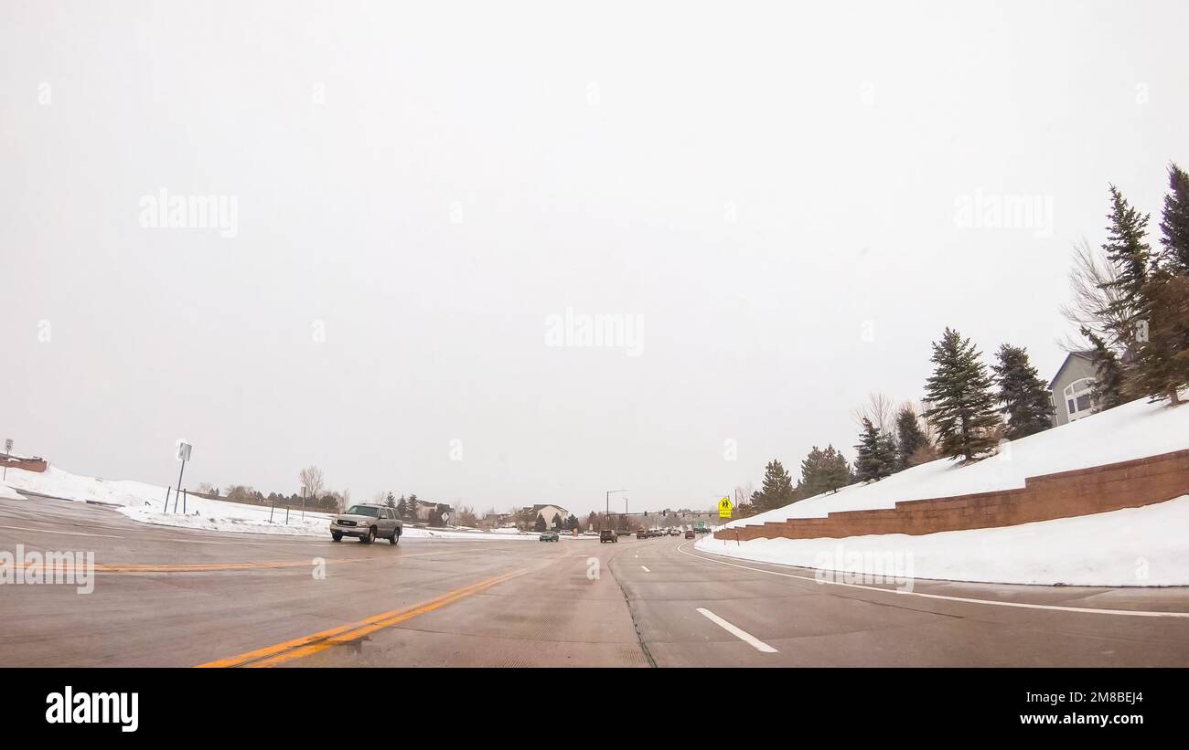 Driving in suburban area Stock Photo - Alamy