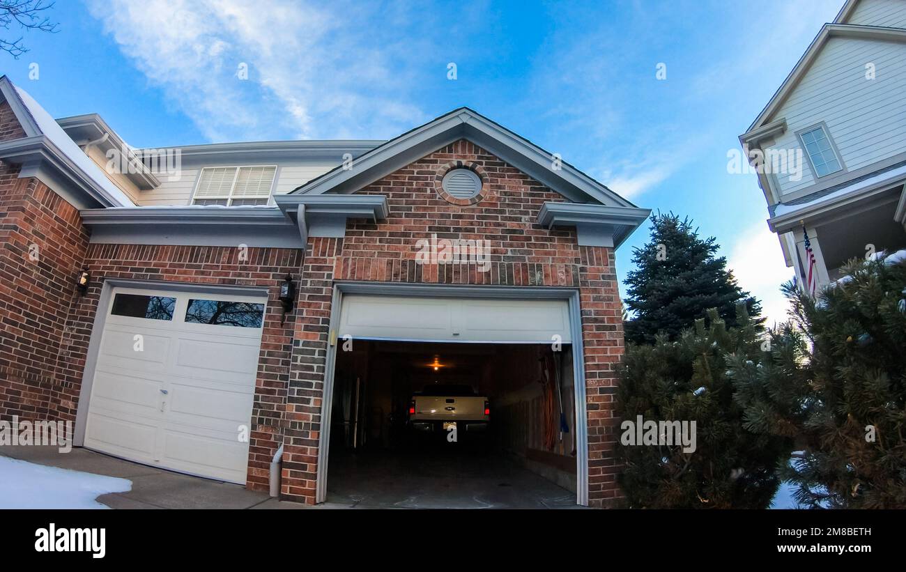 Driving in suburban area Stock Photo - Alamy